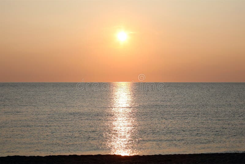 Orange Sun and the Reflection on the Water Stock Photo - Image of water ...