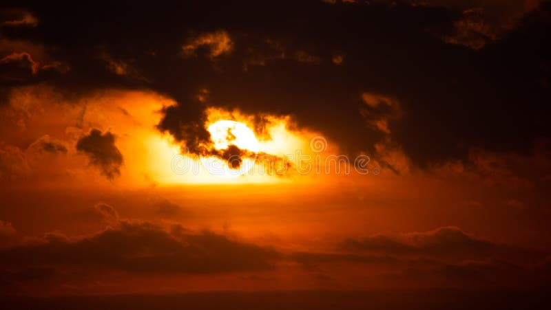 Orange sun in the sky stock photo. Image of cloud, dusk - 137689868