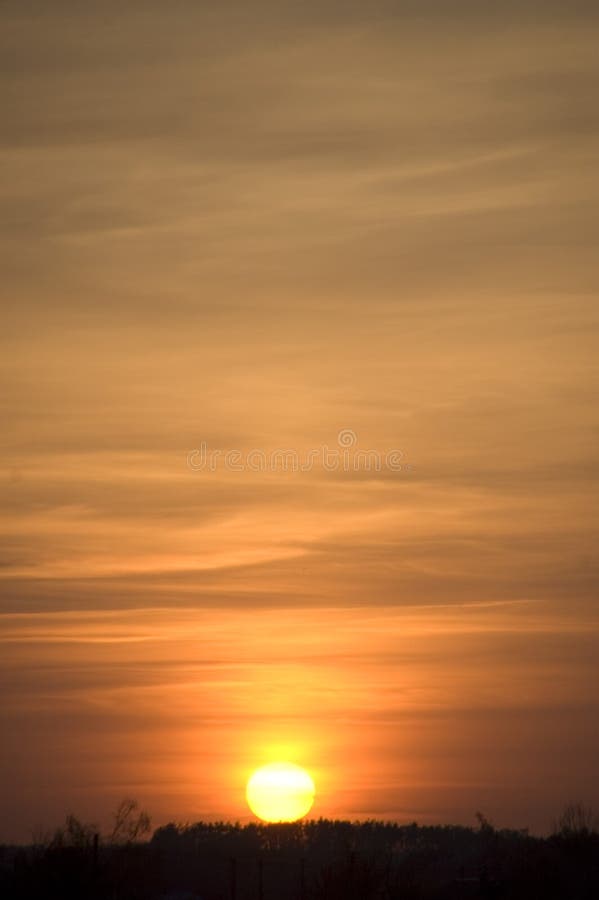 Orange Sun at Sunset Intersected by Orange-gray Stock Image - Image of ...