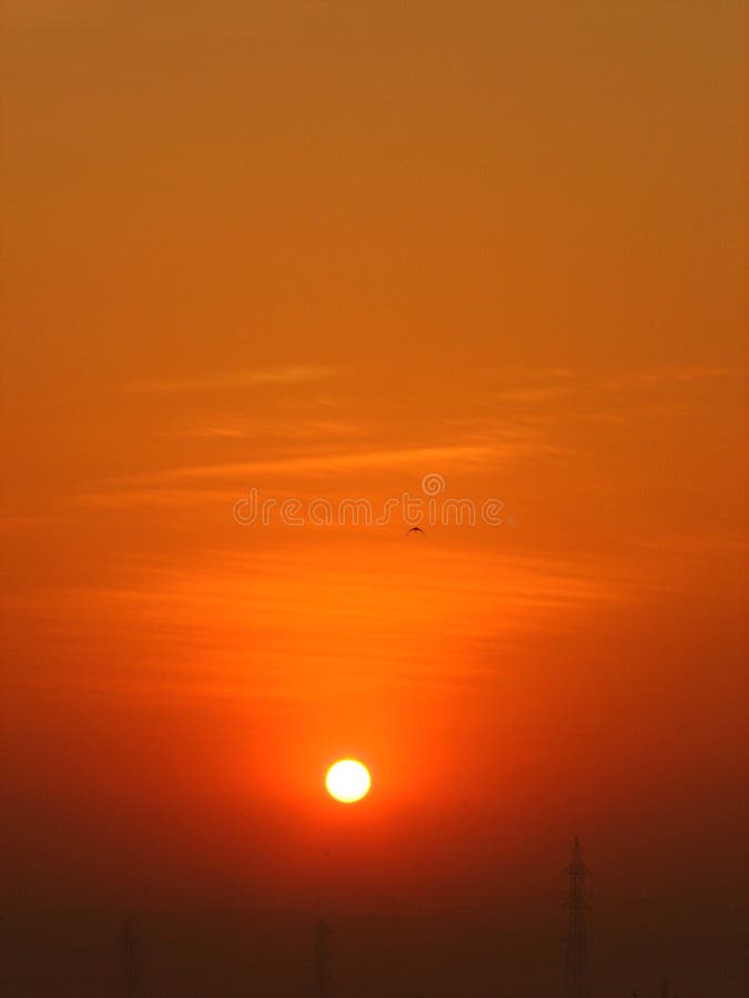 Orange Sunrise stock image. Image of cloudy, sunrise, land - 2059199