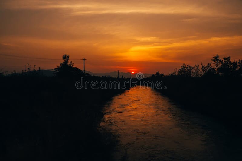 Orange Sunrise on the Background of the Silhouette of Mountains and ...