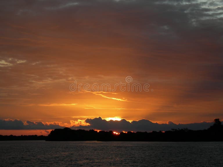 Orange Sunset on the Amazon River Stock Image - Image of reflection ...