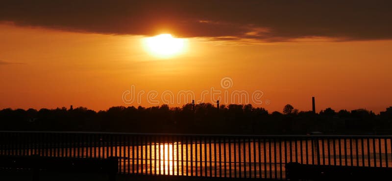 Orange sunset on bridge stock image. Image of sunset - 94476089