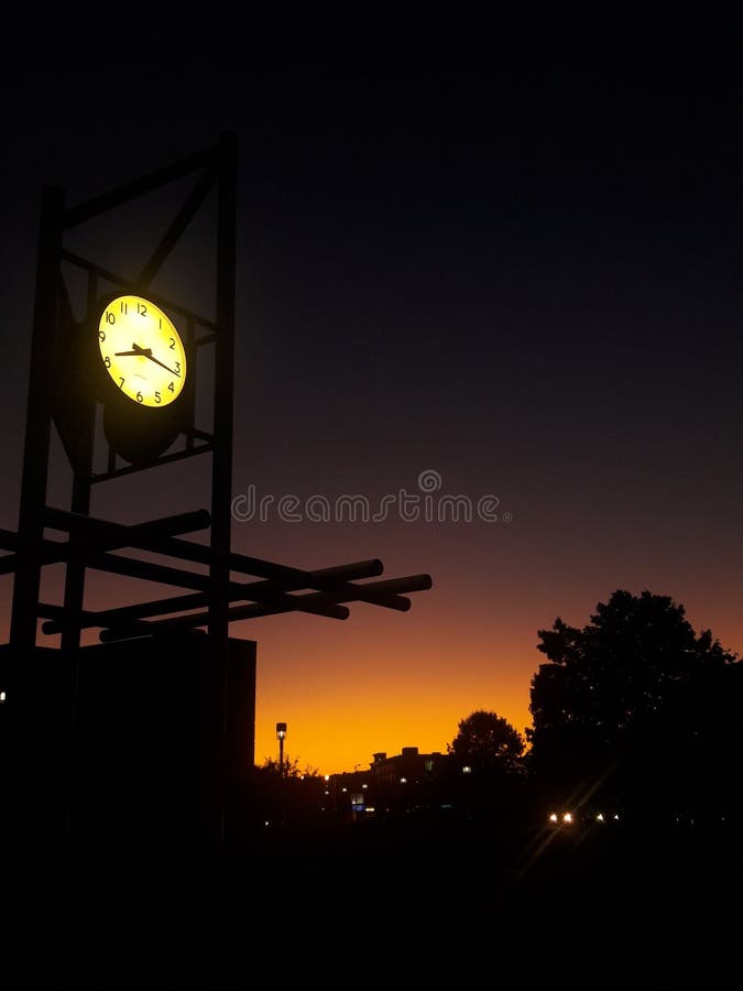 Orange Sunset Clock Tower Campus Stock Photo - Image of clock, sunset ...