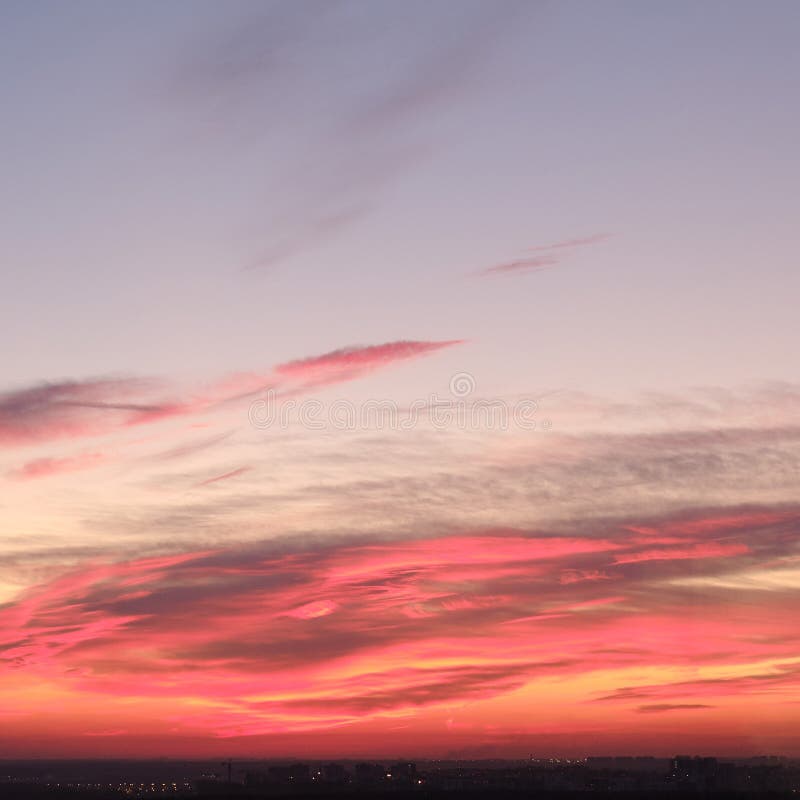 Orange Sunset on a Cloudy Sky Over a Night City Stock Image - Image of ...