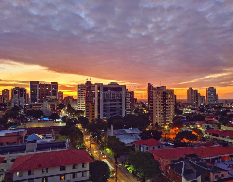 Orange sunset in Fortaleza stock image. Image of evening - 256616397