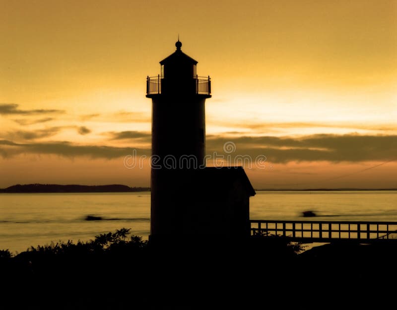 Orange sunset lighthouse stock image. Image of coast - 13072305