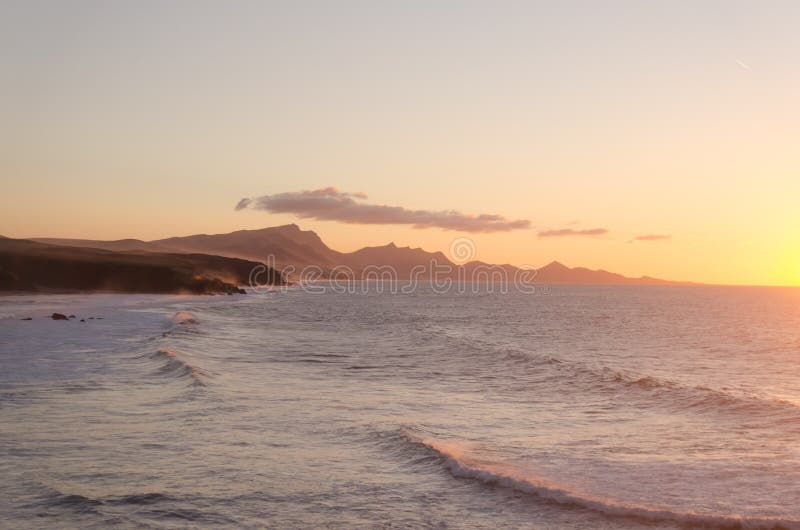 Orange Sunset. Ocean Landscape. Rocks and Wave of Ocean Stock Photo ...