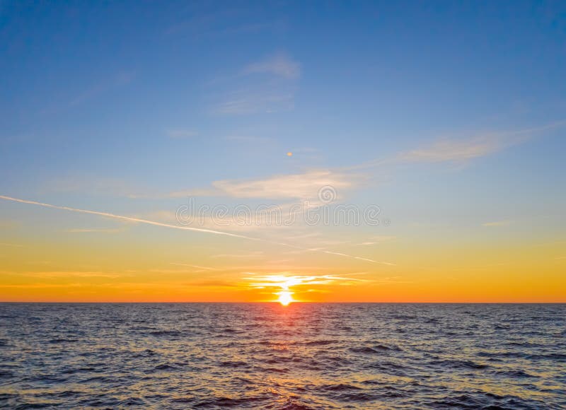 Orange Sunset in the Open Sea Stock Image - Image of cloudy, colorful ...