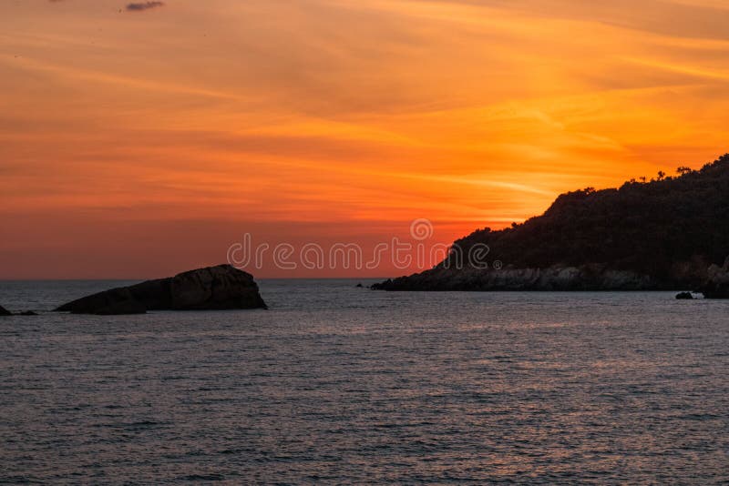 Orange Sunset Over a Cliff in Ulcinj, Montenegro Stock Photo - Image of ...