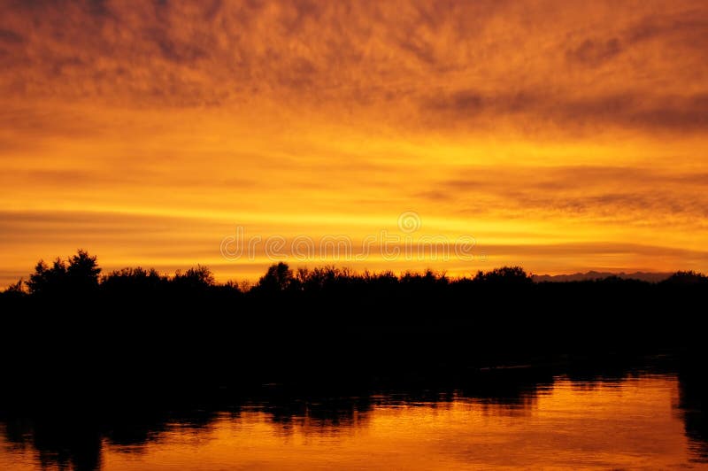 Winter Sunset stock image. Image of lake, orange, silhouette - 2920975