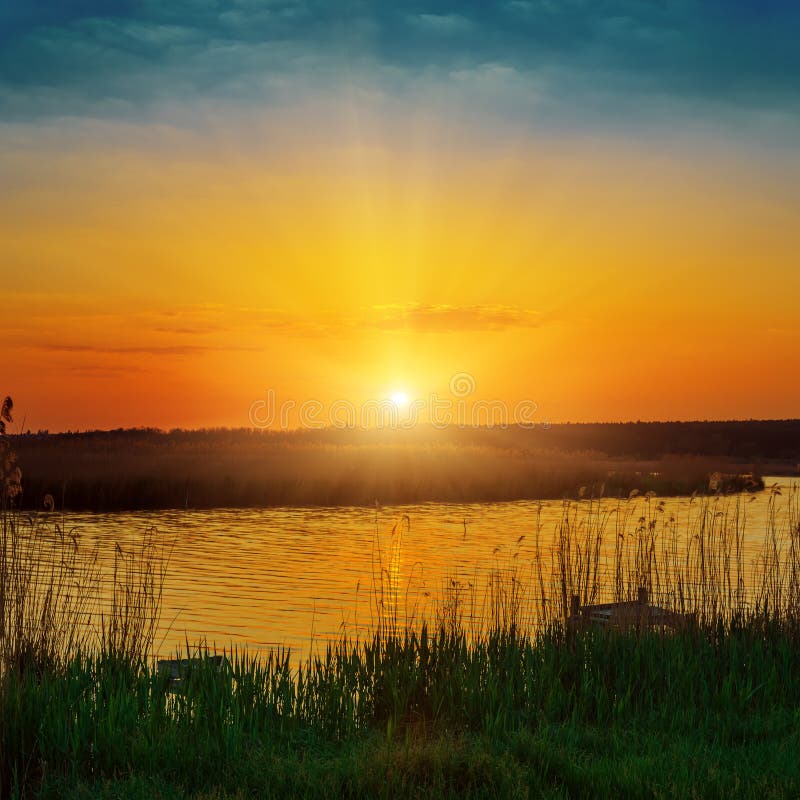 Orange sunset over river stock photo. Image of scenery - 35205840