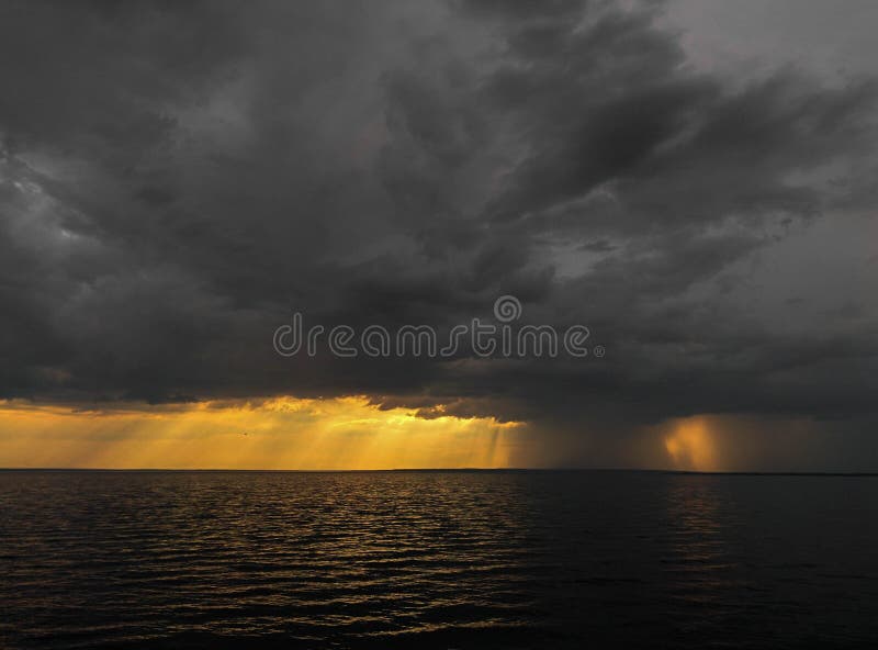 Orange sunset and rain stock image. Image of llight, sunset - 78550821