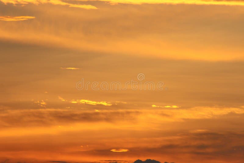 An Orange Sunset Sky with Bright Sun Stock Image - Image of light, wide ...