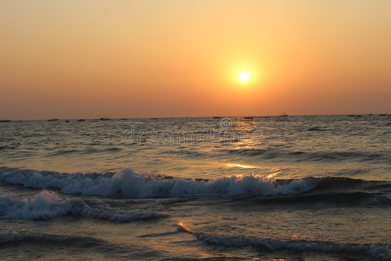 View of a Orange Sunset Skay at Miramar Beach, Goa, India Stock Photo ...