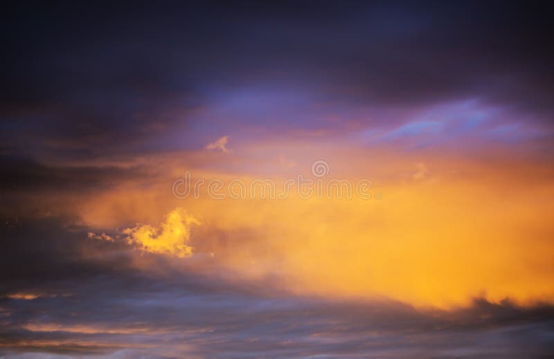 Orange Sunset with a Small Cloud Stock Photo - Image of purple ...