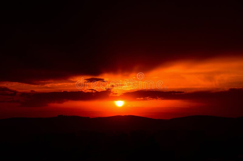 Orange Sunset stock image. Image of cloudy, visible, warm - 97659247