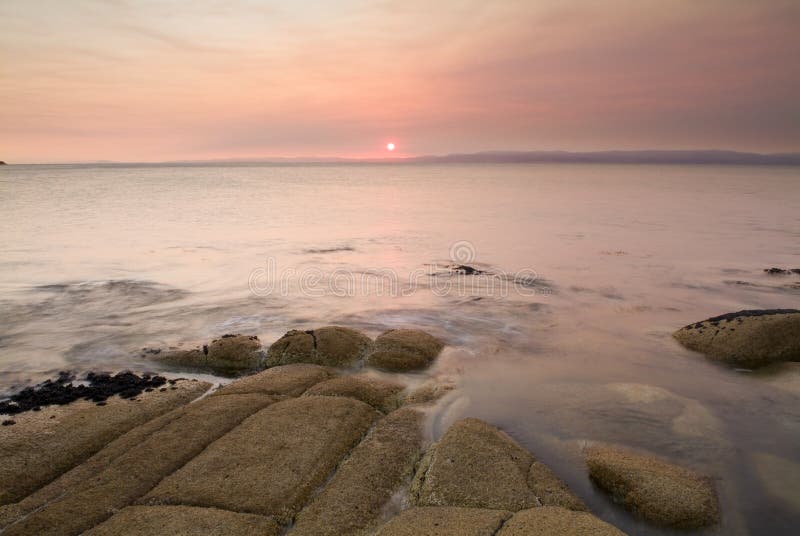 Orange Sunset Water stock image. Image of rocks, peace - 14184713