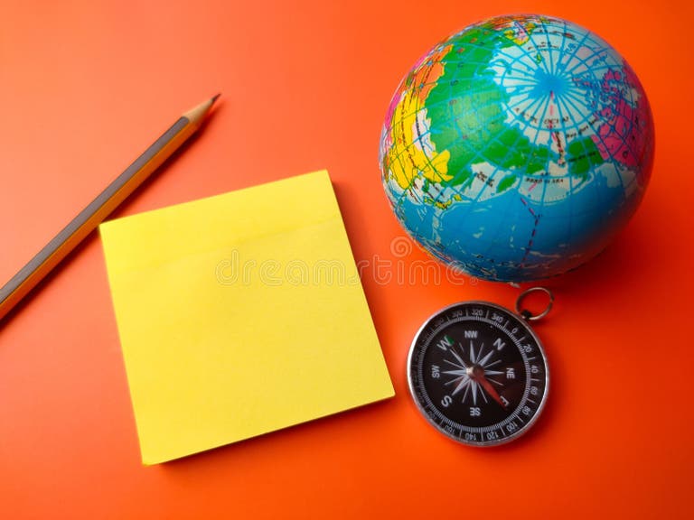 Orange Table on a Blank Sticky Note with Pencil,compass and Earth Globe ...