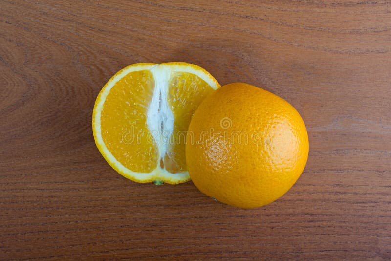 Orange on a table stock photo. Image of tropical, eating - 74289518