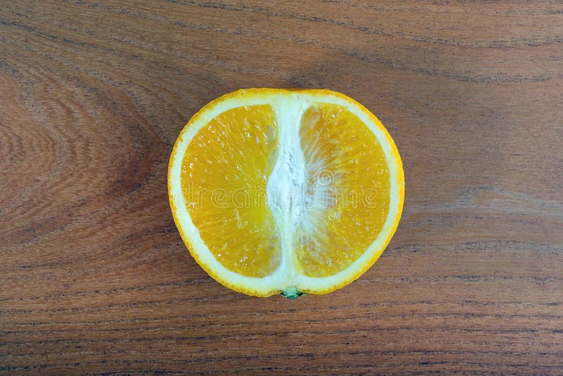 Orange on a table stock image. Image of sliced, natural - 74289537