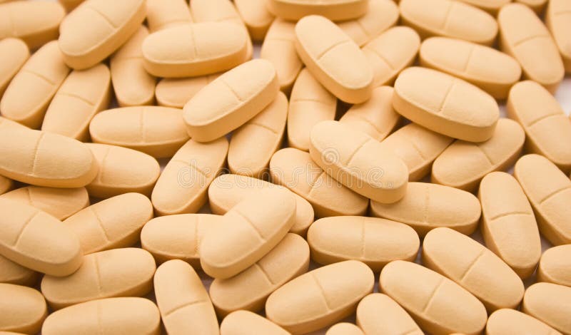 Big Orange Tablets of Multivitamin Complex Stock Photo - Image of ...