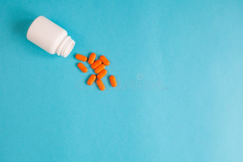 Orange Tablets in Plastic Container Top View Stock Photo - Image of ...
