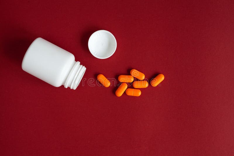 Orange Tablets in Plastic Container Top View Stock Image - Image of ...