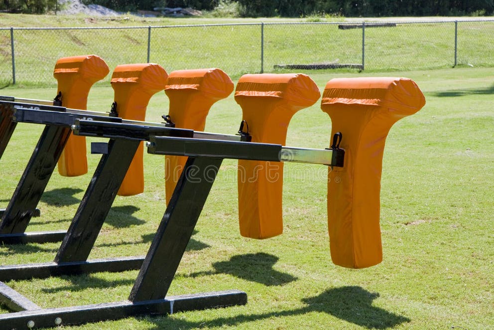 Orange Tackling Dummies stock photo. Image of game, play - 6401076