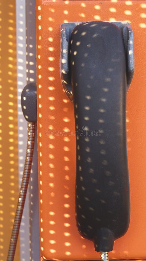 Orange Telephone Receiver with Shawdow Light. Stock Image - Image of ...