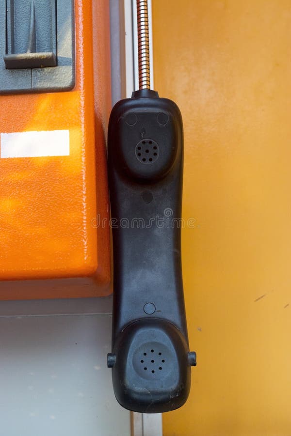 Orange Telephone Receiver with Shawdow Light. Stock Photo - Image of ...