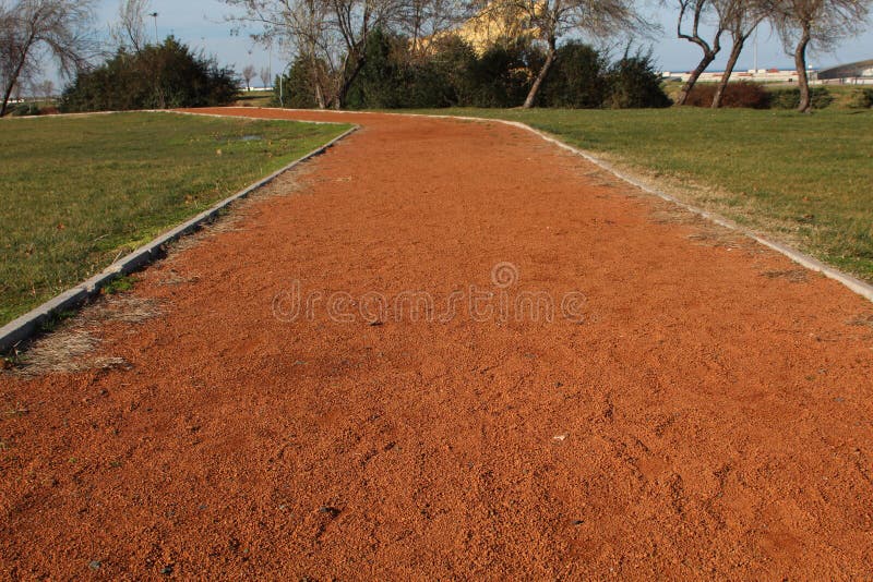 Orange Terra Cota Walking Path at Park Stock Photo - Image of natural ...