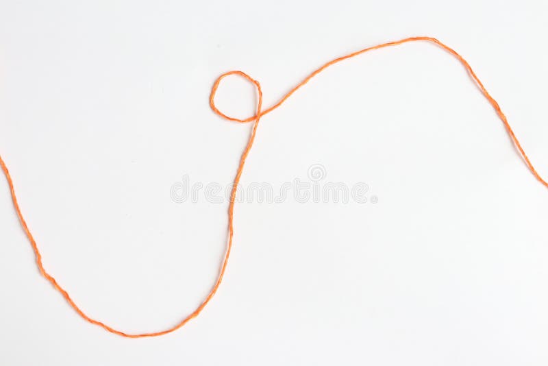 Orange Thread on a Piece of Paper. Stock Photo - Image of chaotic ...