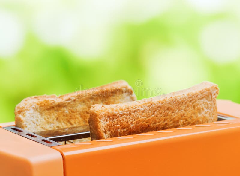 Orange Toaster with Two Slices of Bread Stock Image - Image of heat ...