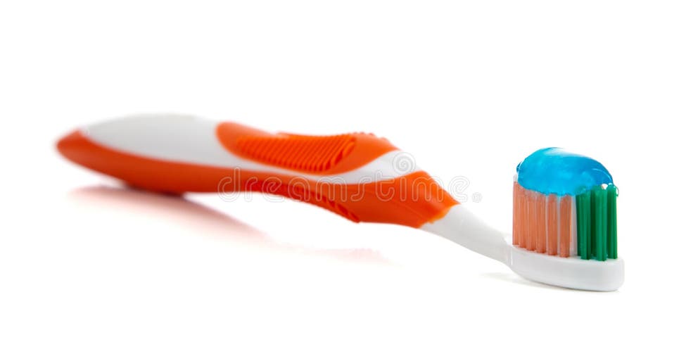 Orange Toothbrush and Toothpaste on White Stock Photo - Image of paste ...