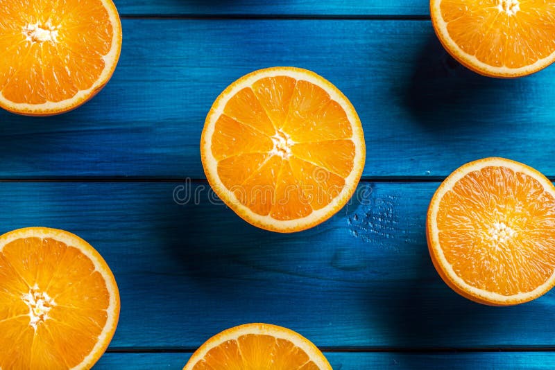 Orange. Top of View Cut Fresh Oranges on a Blue Table Stock Image ...