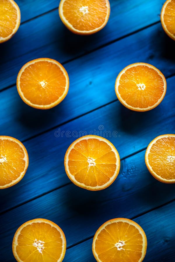 Orange. Top of View Cut Fresh Oranges on a Blue Table Stock Image ...
