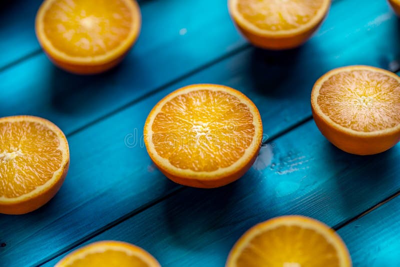 Orange. Top of View Cut Fresh Oranges on a Blue Table Stock Photo ...