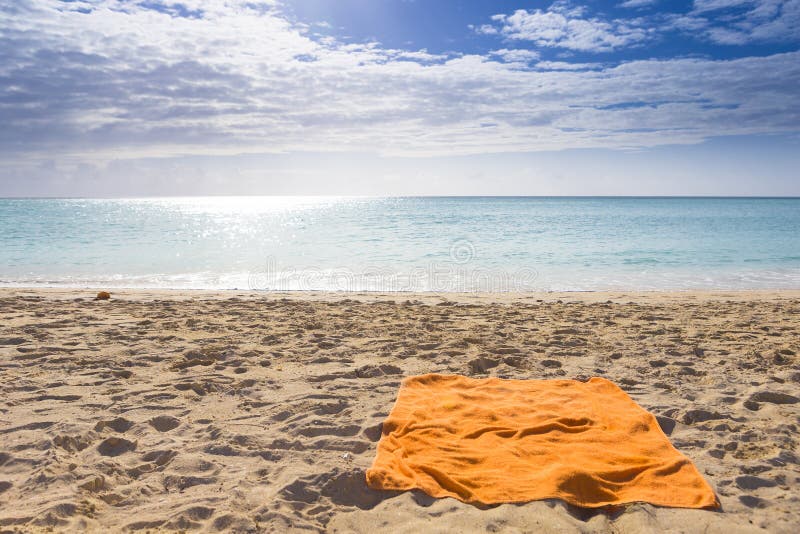 Orange Towel on a Tropical Beach Stock Photo - Image of summer, ocean ...