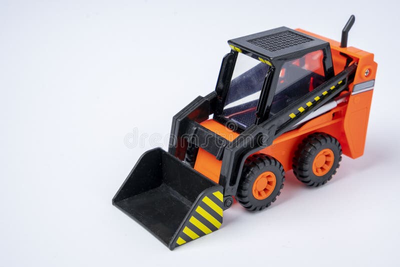 Orange Toy Loader on White Background, Mini Loader, Toy Industrial Car ...