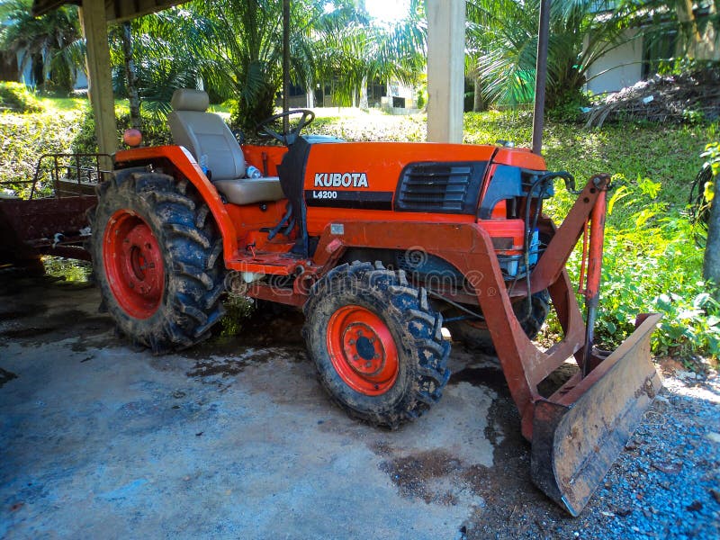 Orange tractor editorial stock photo. Image of kubota - 47878813