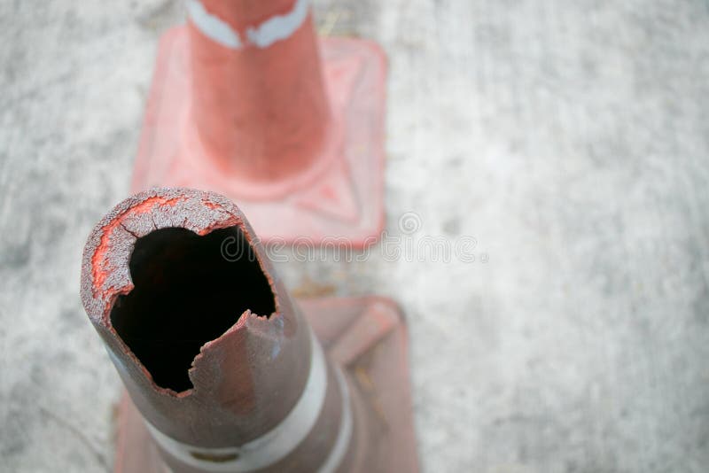 Damaged Traffic Cone In Gutter, Road Undergoing Repairs Stock Photo ...