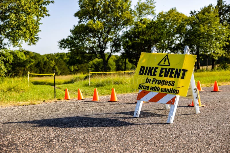 Orange Traffic Cones and a Warning Sign on the Road Stock Image - Image ...