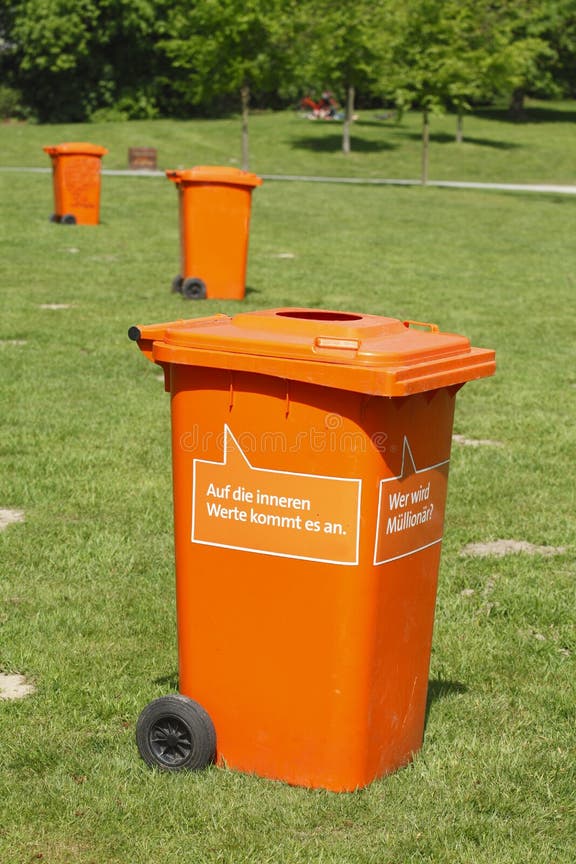 Orange Trash Can stock image. Image of bins, race, refuse - 98246365