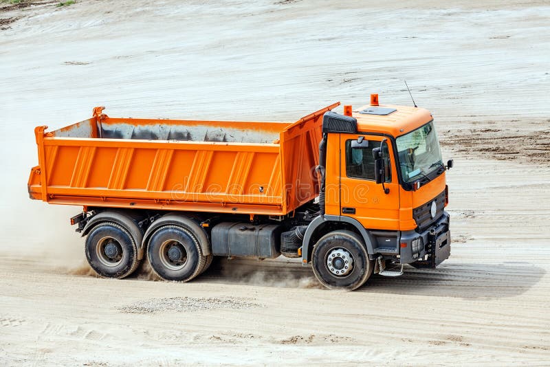 Orange truck stock image. Image of dirt, freight, dump - 45530499