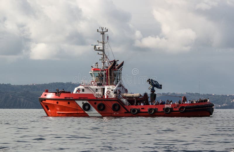 Orange tugboat in action editorial stock image. Image of gulf - 27419029