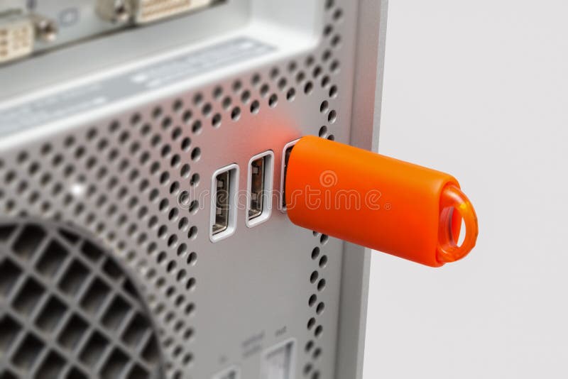 Orange USB Flash Drive Connecting To Desktop Computer Stock Photo ...