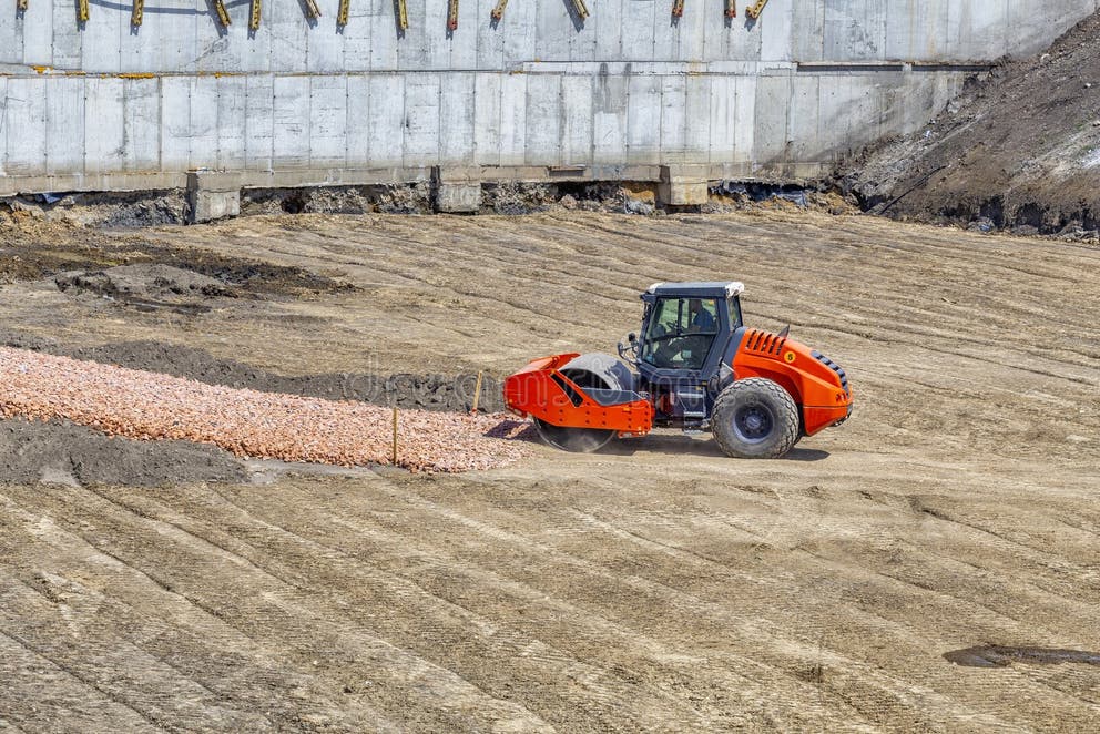 Orange Vibratory Roller Compactor Stock Photo - Image of earthworks ...