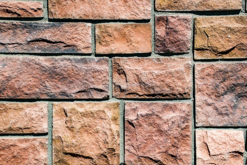 Orange wall and bricks stock photo. Image of bricks - 164113110