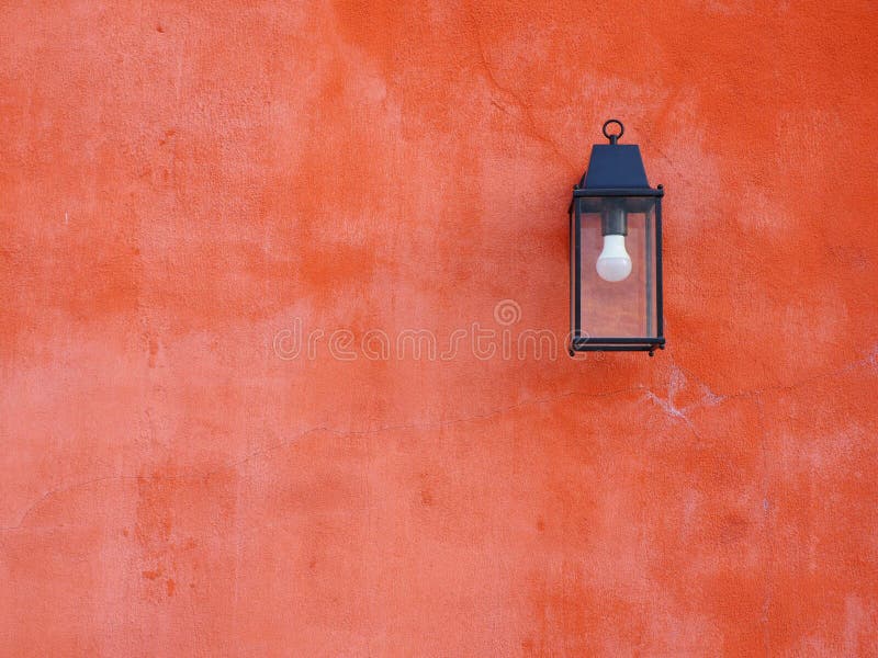 Orange wall with lamp stock photo. Image of color, lamp - 88412026